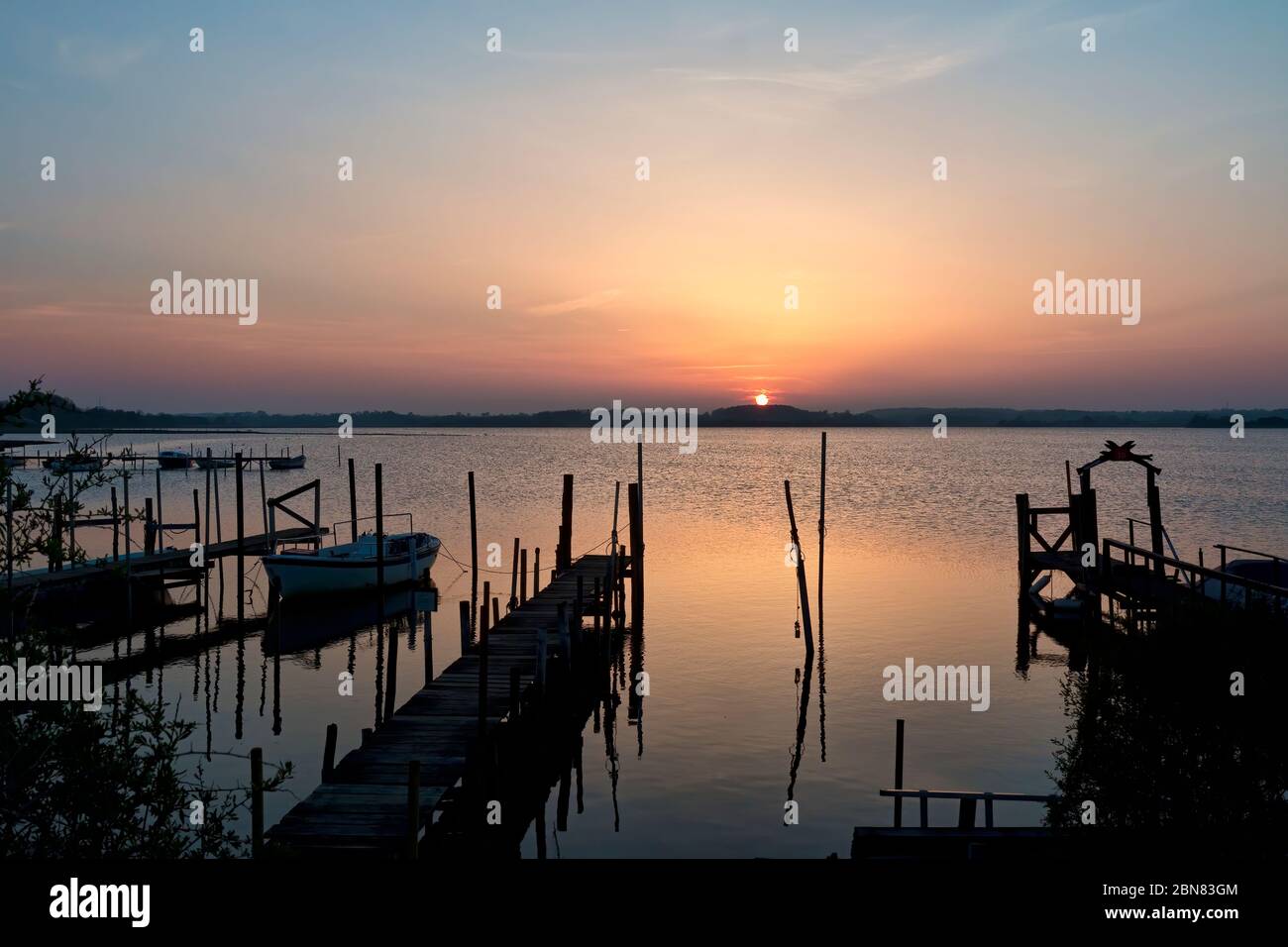 Sunset at the inlet at Hejlsminde, Denmark Stock Photo - Alamy