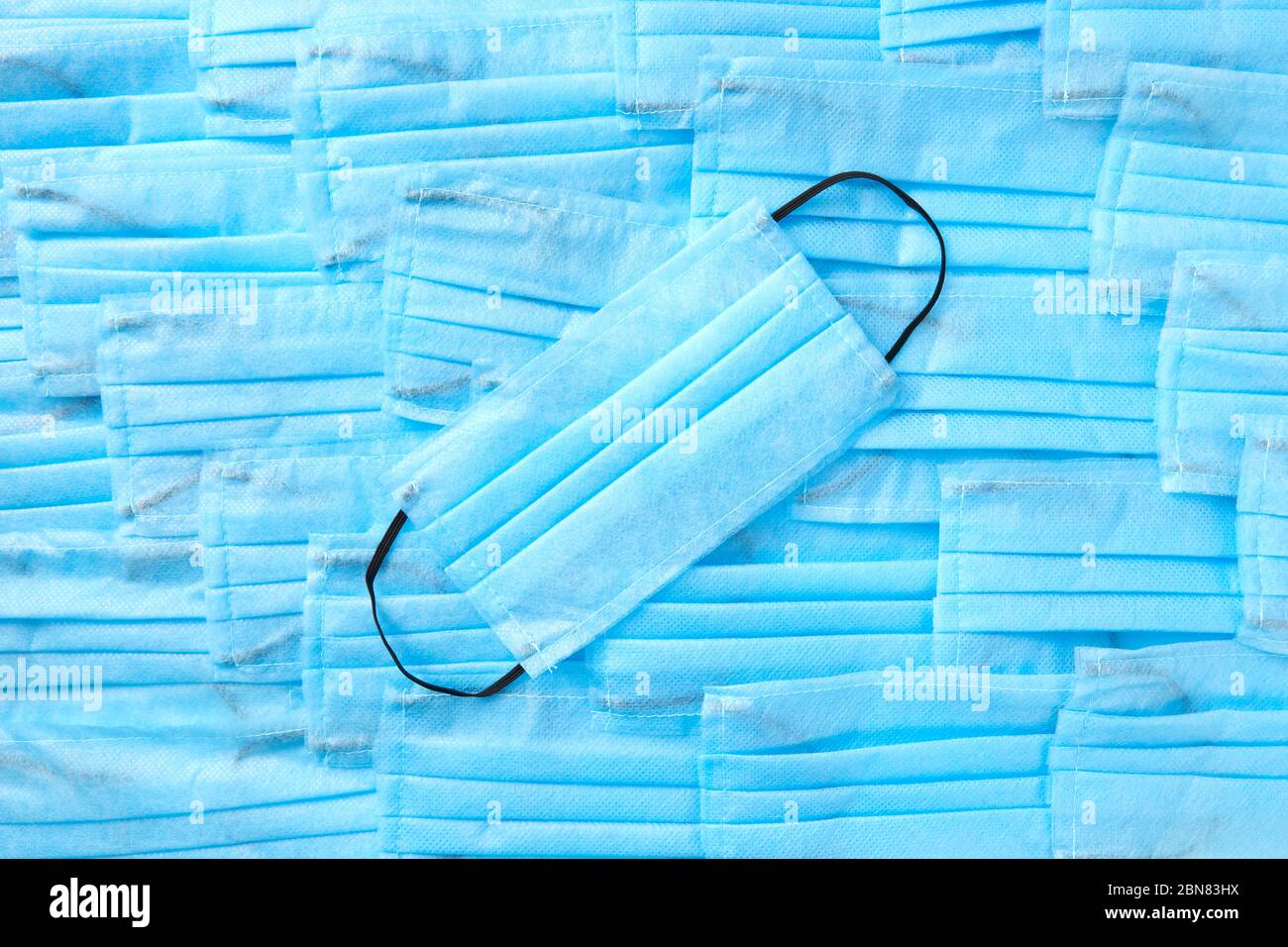 Top view blue surgical masks hi-res stock photography and images - Alamy