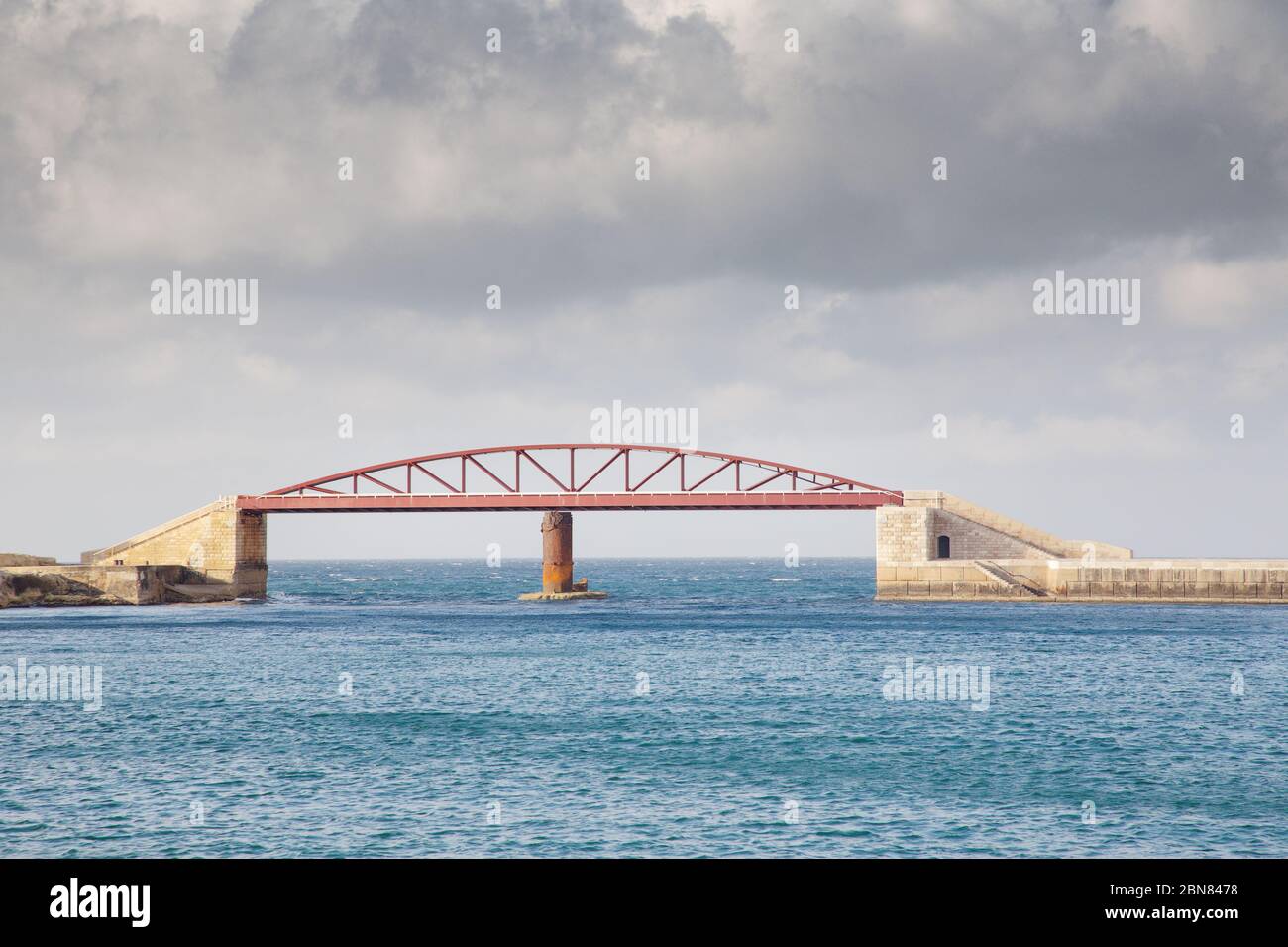 Valletta breakwater bridge in malta Stock Photo - Alamy
