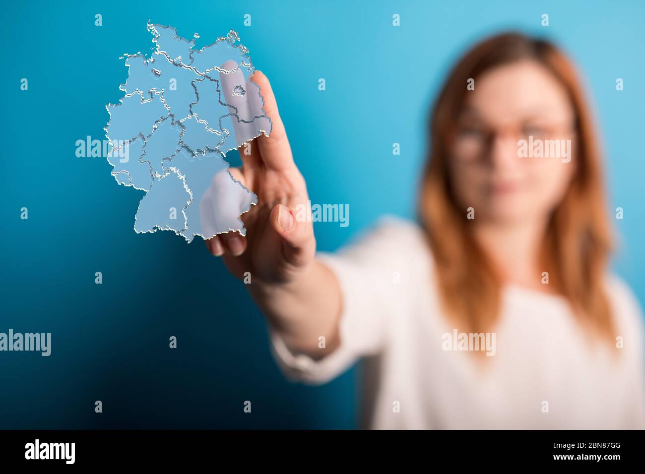 A a virtual germany land map digital in hand 3d Stock Photo - Alamy