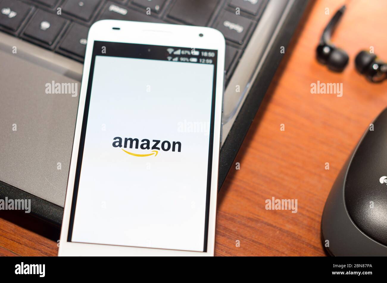 QUITO, ECUADOR - AUGUST 3, 2015: White smartphone closeup lying on ...