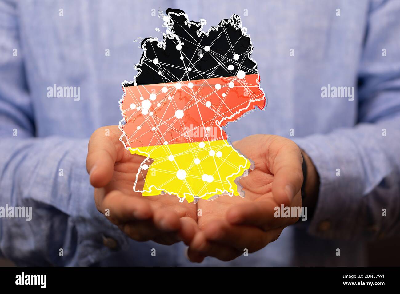 A germany map digital in hand 3d Stock Photo - Alamy