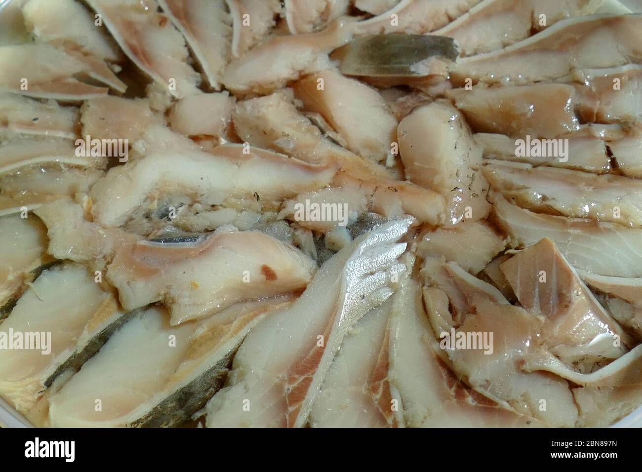 chopped herring in oil in an open package Stock Photo - Alamy