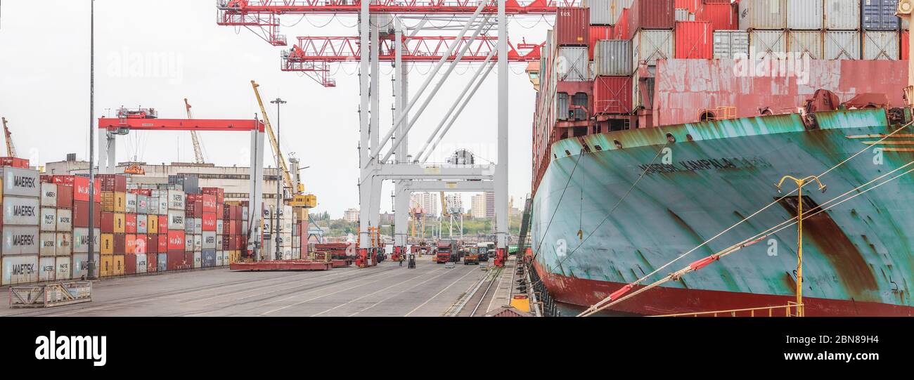 SINGAPORE - MAY 08 2020: Container cargo ship load in the seaport ...
