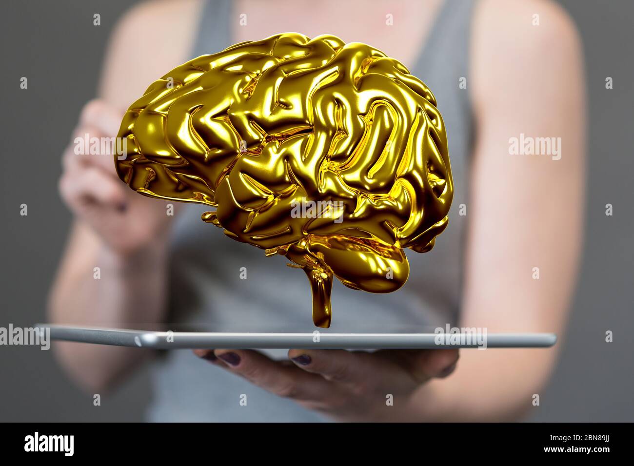 A gold brain Stock Photo - Alamy