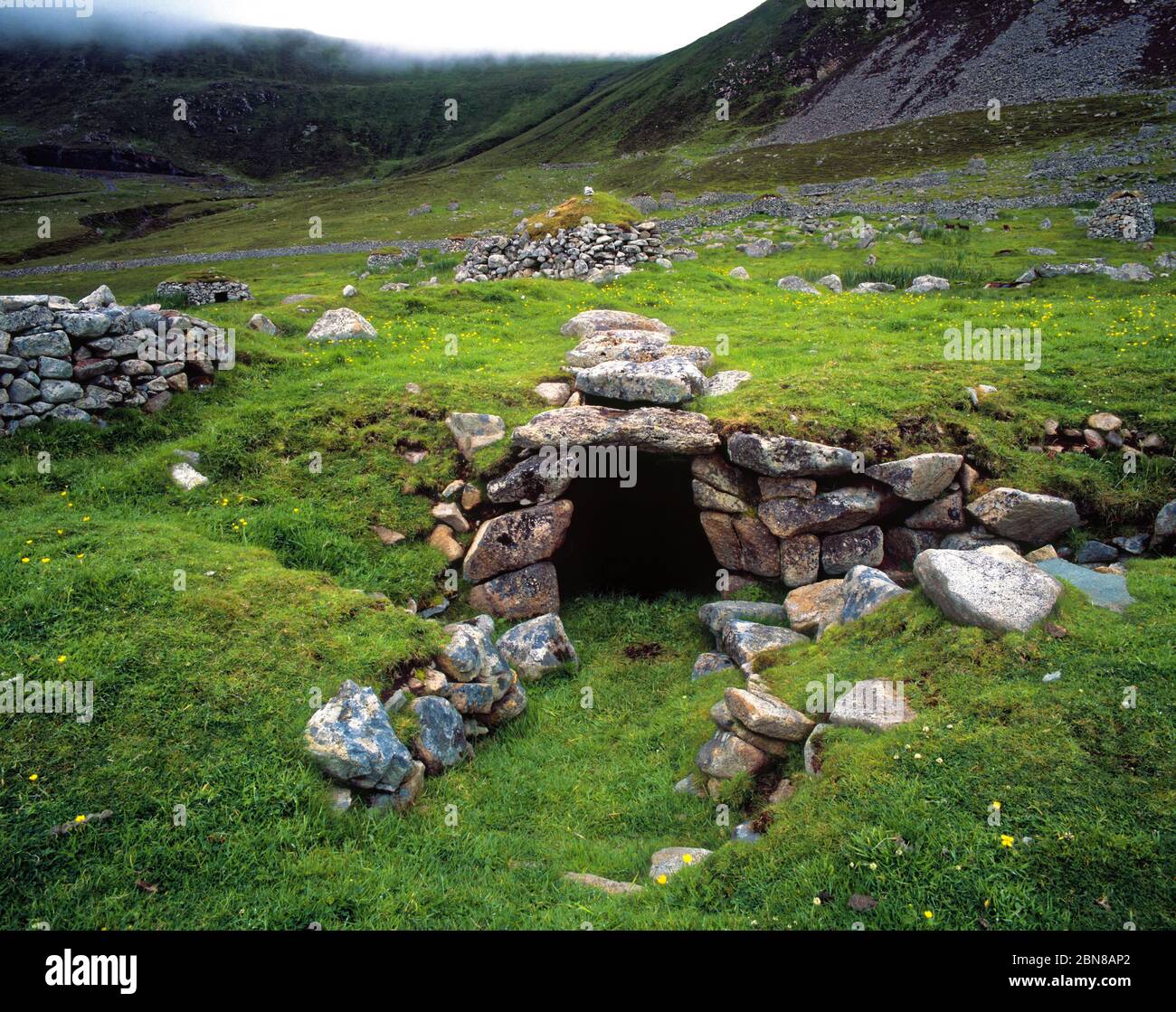 Ruins of last residents houses and storage huts on Island of Hirta, St ...
