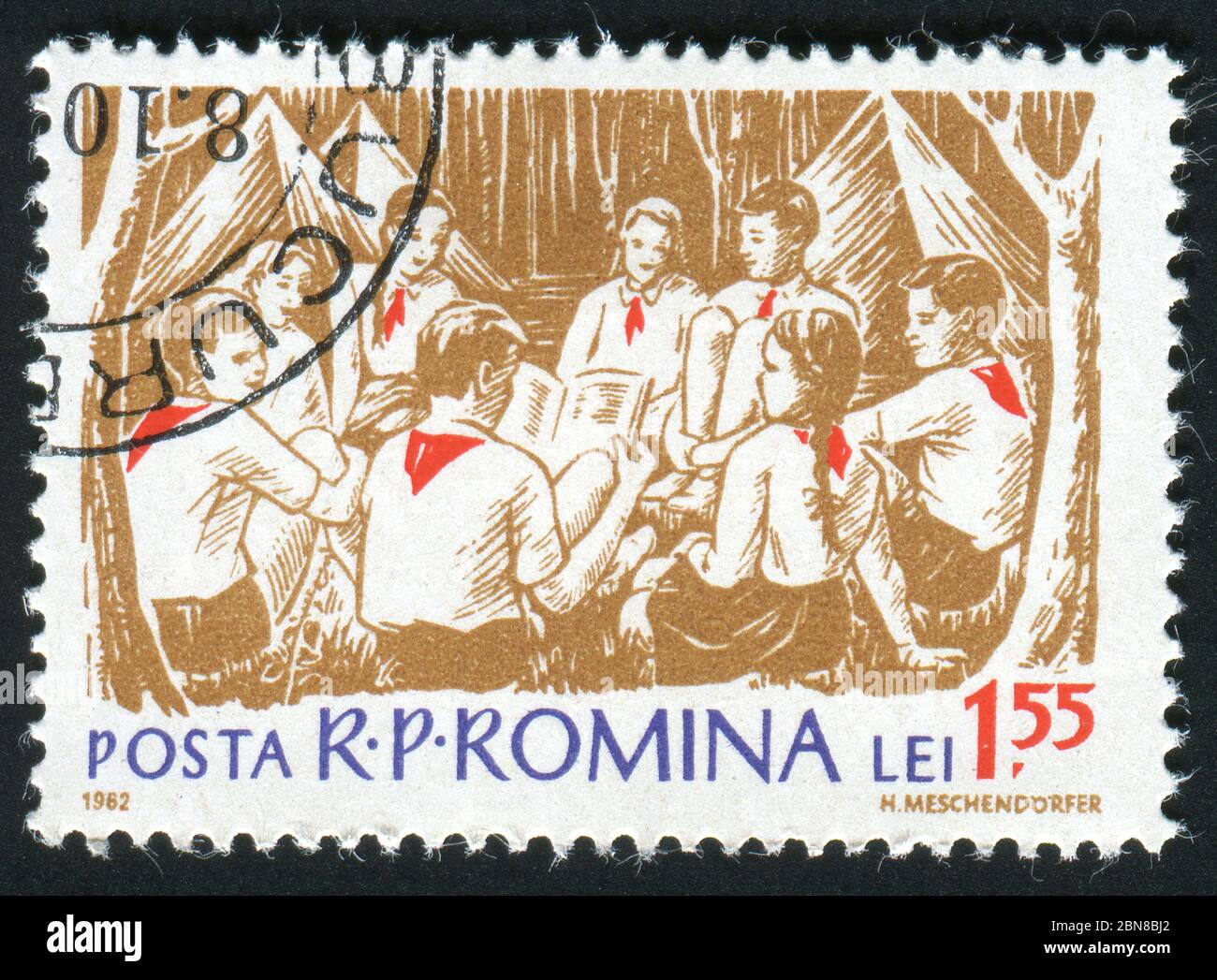 ROMANIA - CIRCA 1962: The Romanian pioneers read the book, circa 1962 ...