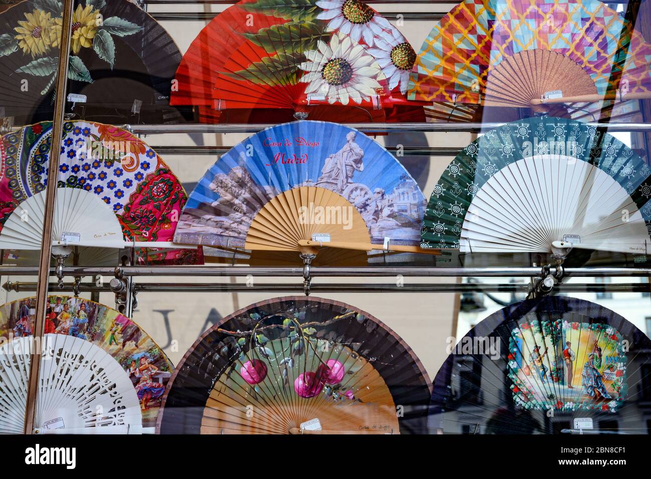 Traditional Spanish fans on sale in the shop window of Casa de Diego in ...
