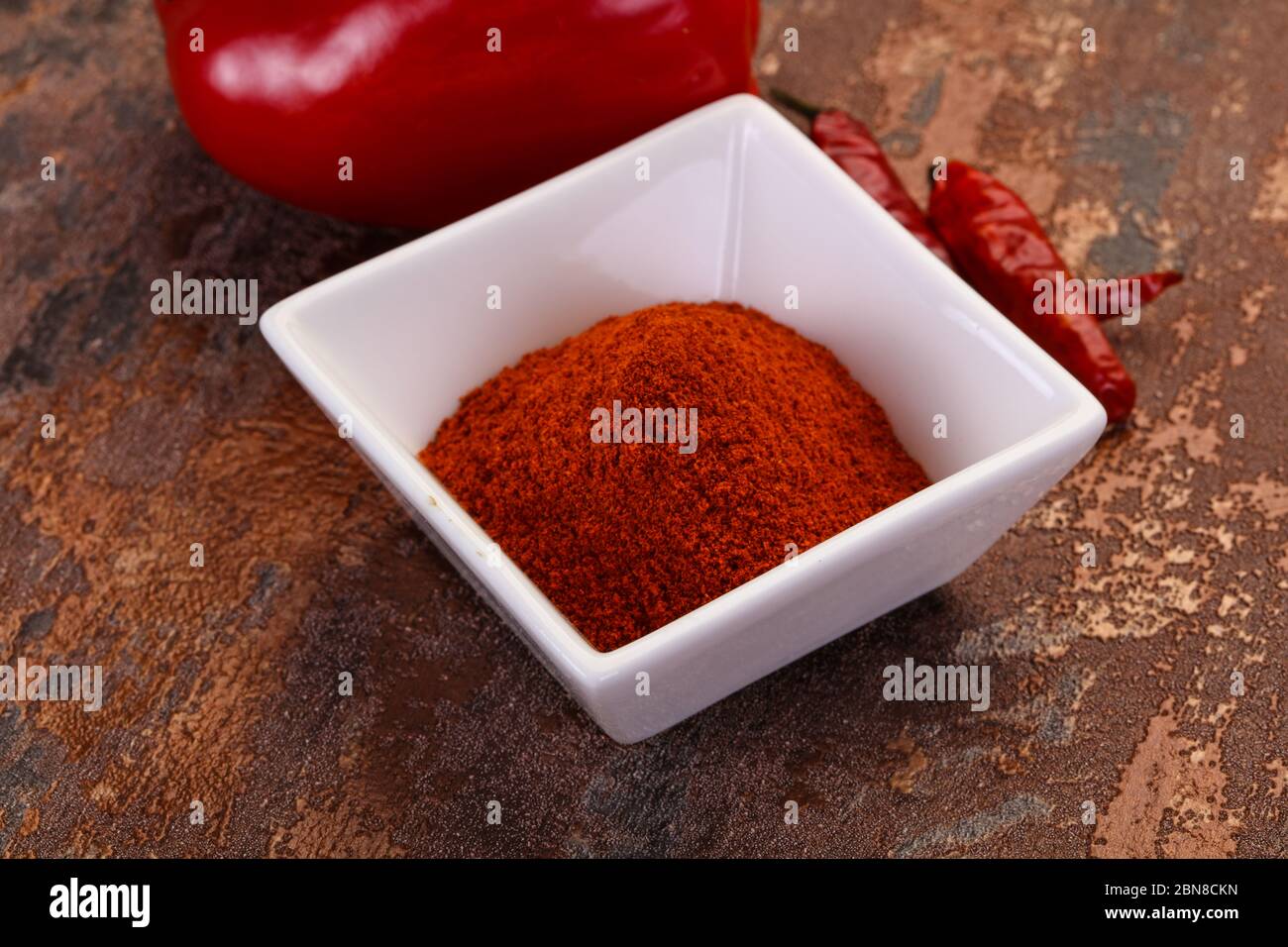 Sweet Paprika powder in the bowl Stock Photo - Alamy
