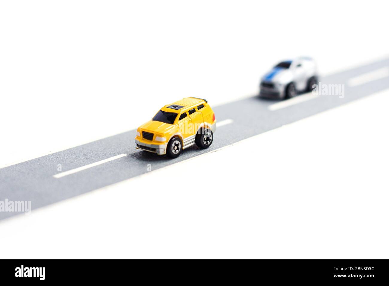 Cars on road speed Cut Out Stock Images & Pictures - Alamy