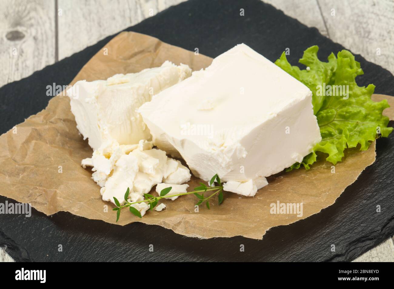 Greek traditional Feta soft cheese in the plate Stock Photo - Alamy