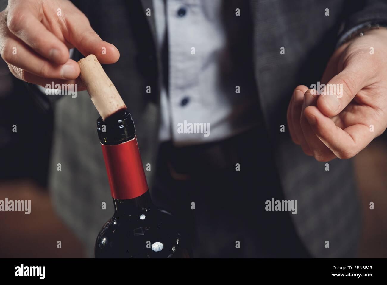 Man sniffing cork hi-res stock photography and images - Alamy