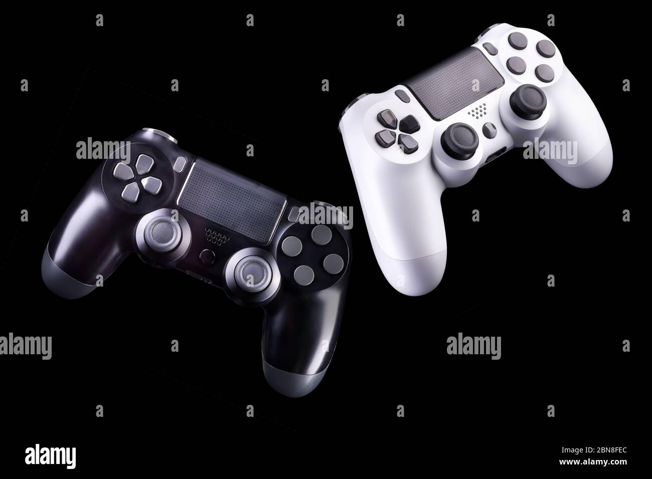 Set of video game joysticks gamepad isolated on a black background ...