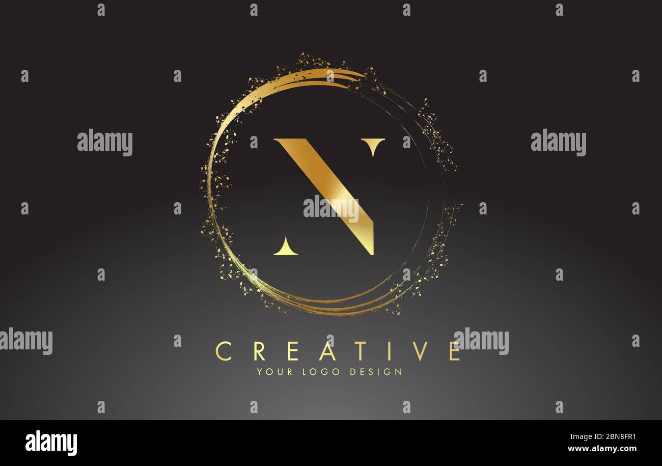 N golden letter logo with golden sparkling rings and dust glitter on a ...