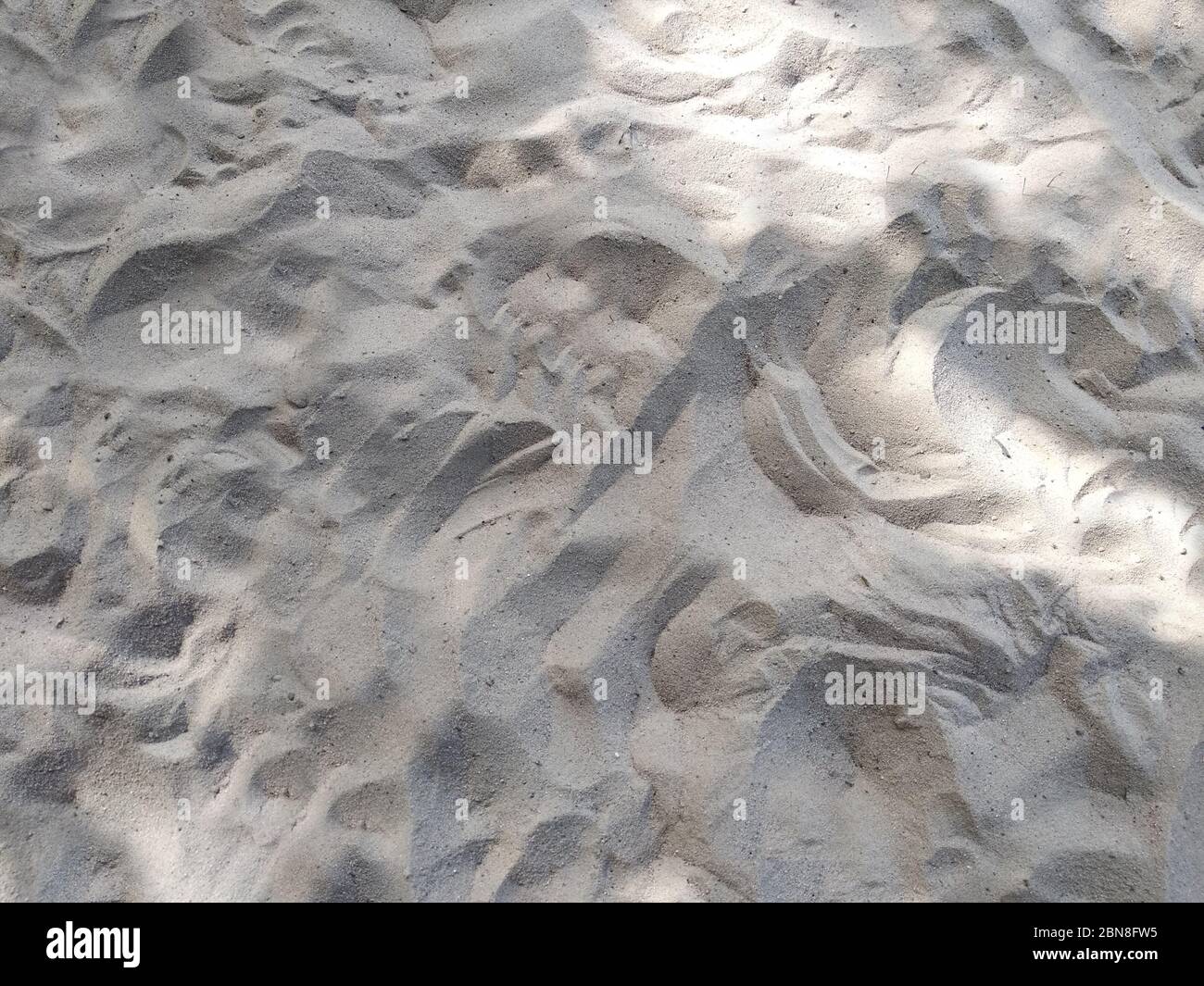 Natural background of sand texture with irregularities and depressions ...