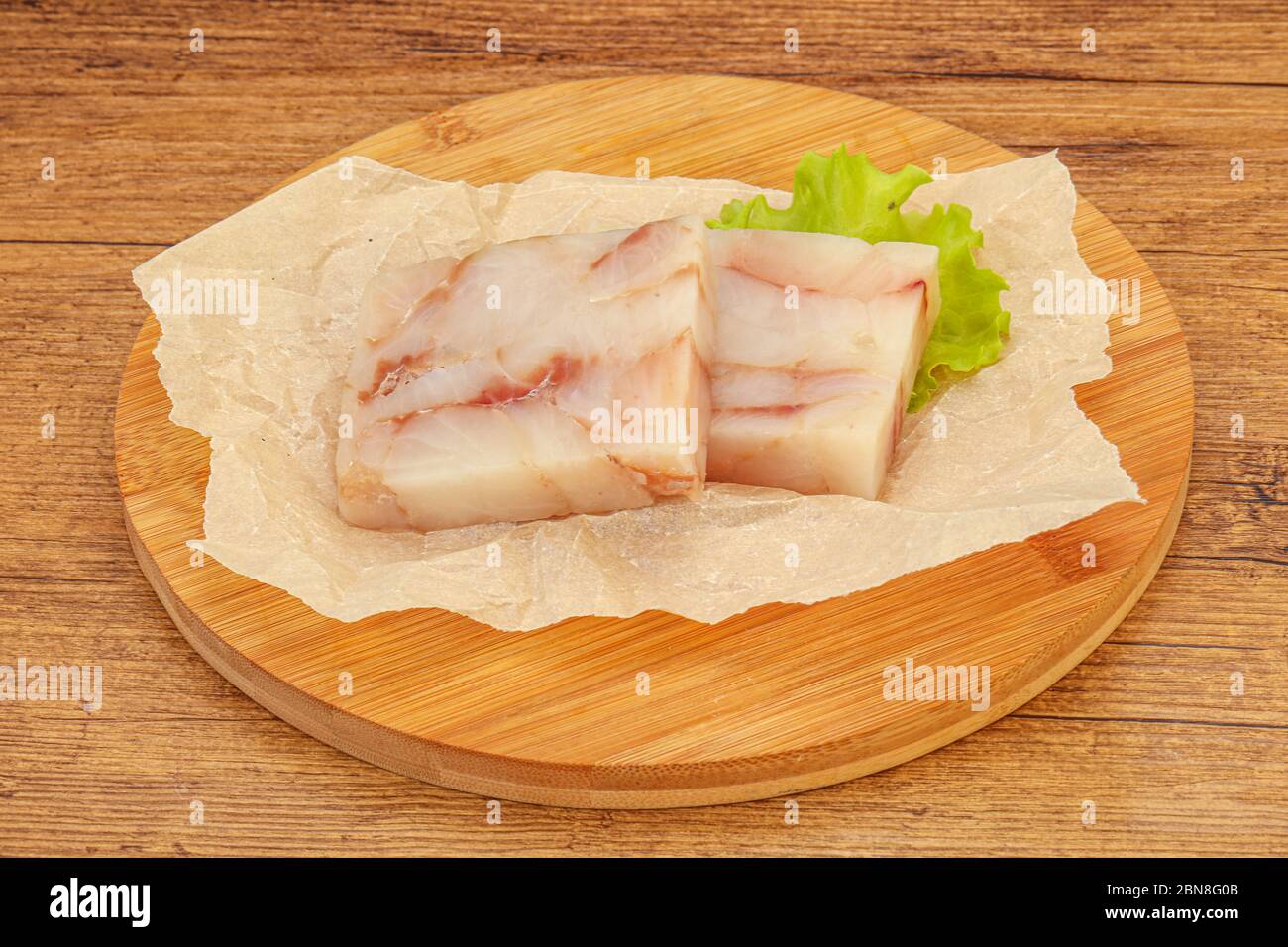 Raw dietary pollock fish fillet for cooking Stock Photo - Alamy