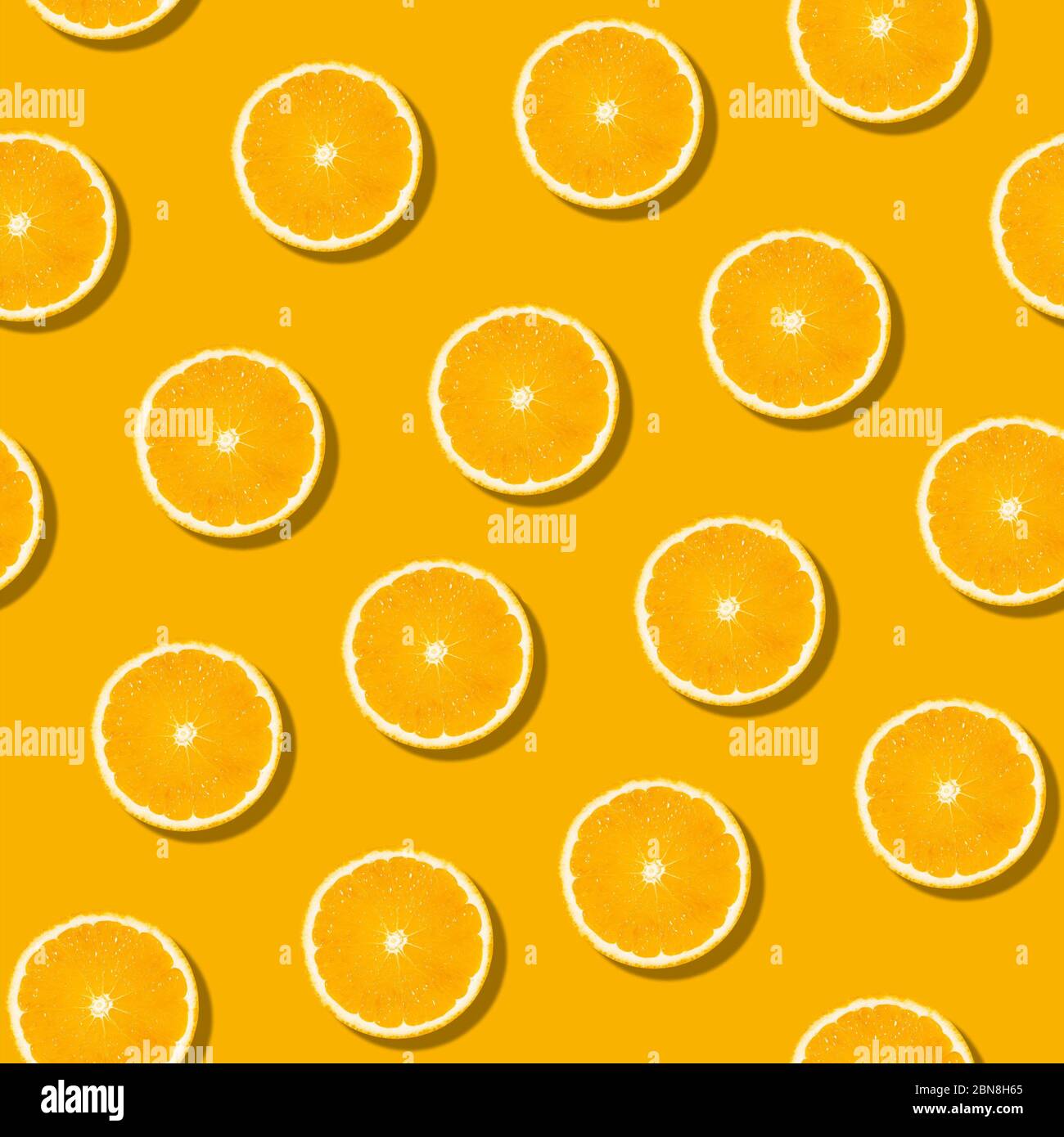 Seamless orange slice pattern on orange surface. Colorful fresh citrus ...