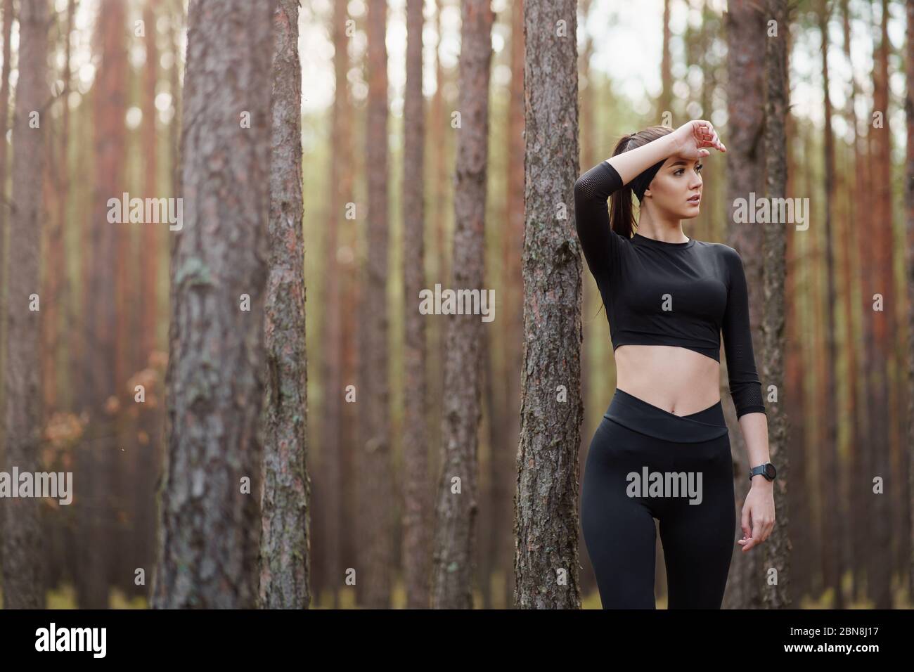 Beautiful fit girl. Fitness model outdoors. Female runner during ...