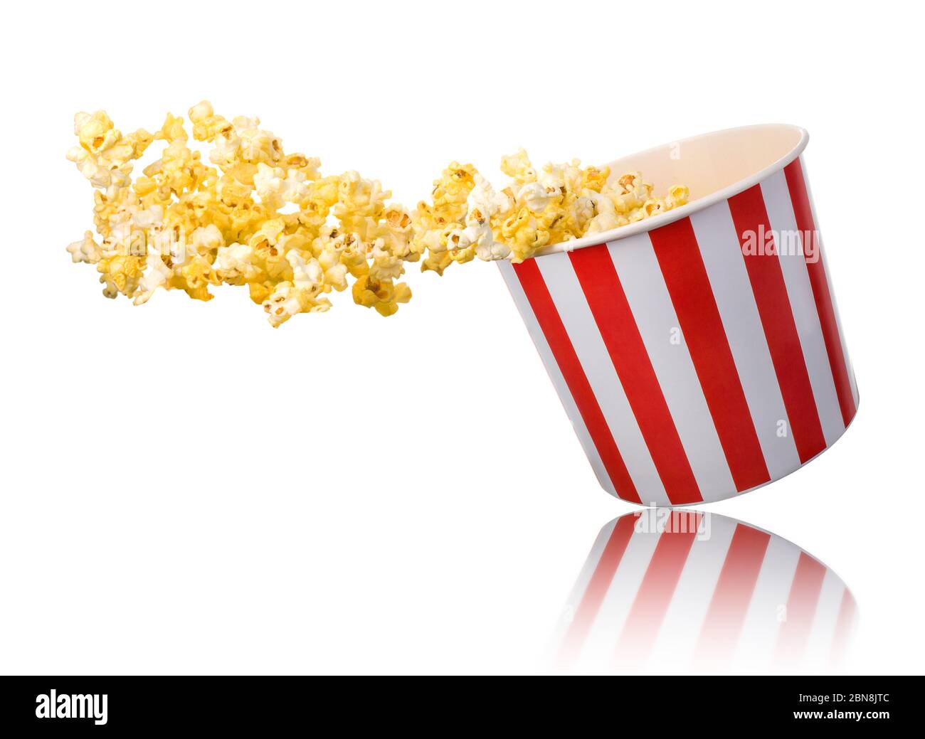Flying popcorn from paper striped bucket isolated on white background ...