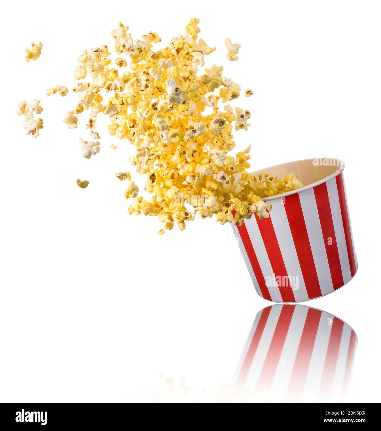 Flying popcorn from paper striped bucket isolated on white background ...