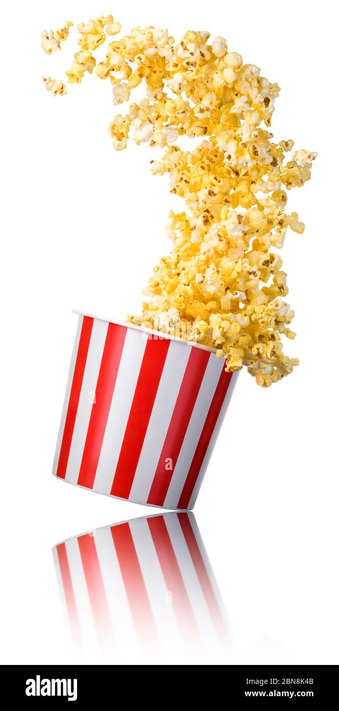 Flying popcorn from paper striped bucket isolated on white background ...