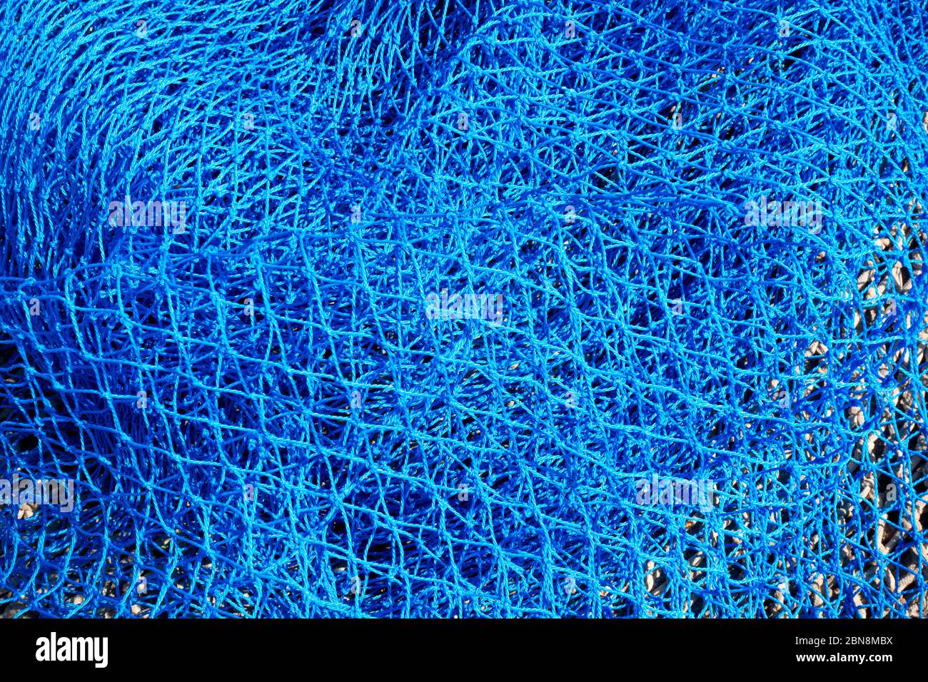 Commercial blue color fishing nets background. Top view Stock Photo - Alamy