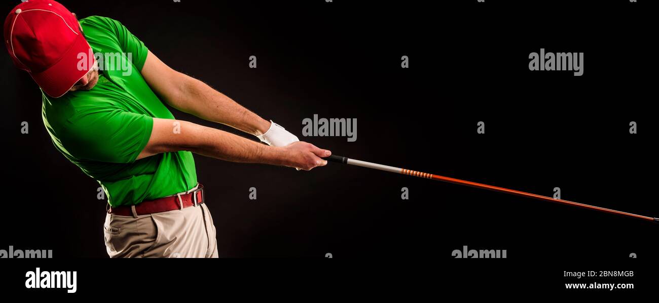 Portrait of a golf player hitting the perfect golf shot isolated on ...