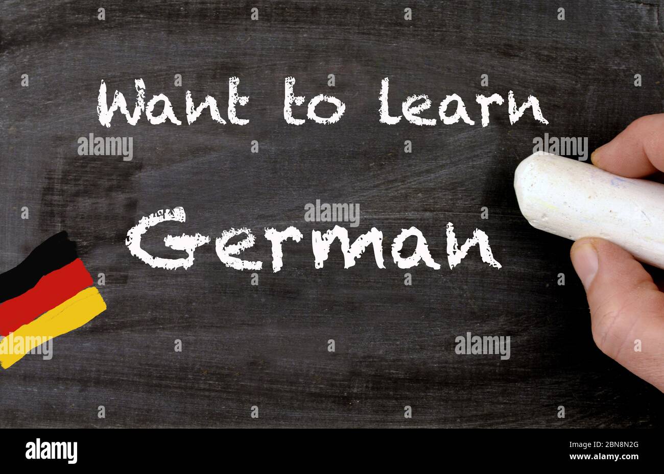 German flag on blackboard hand hi-res stock photography and images - Alamy