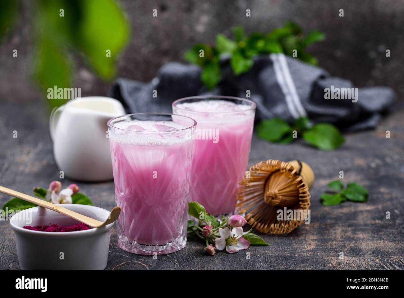 Pink matcha ice latte with milk Stock Photo - Alamy