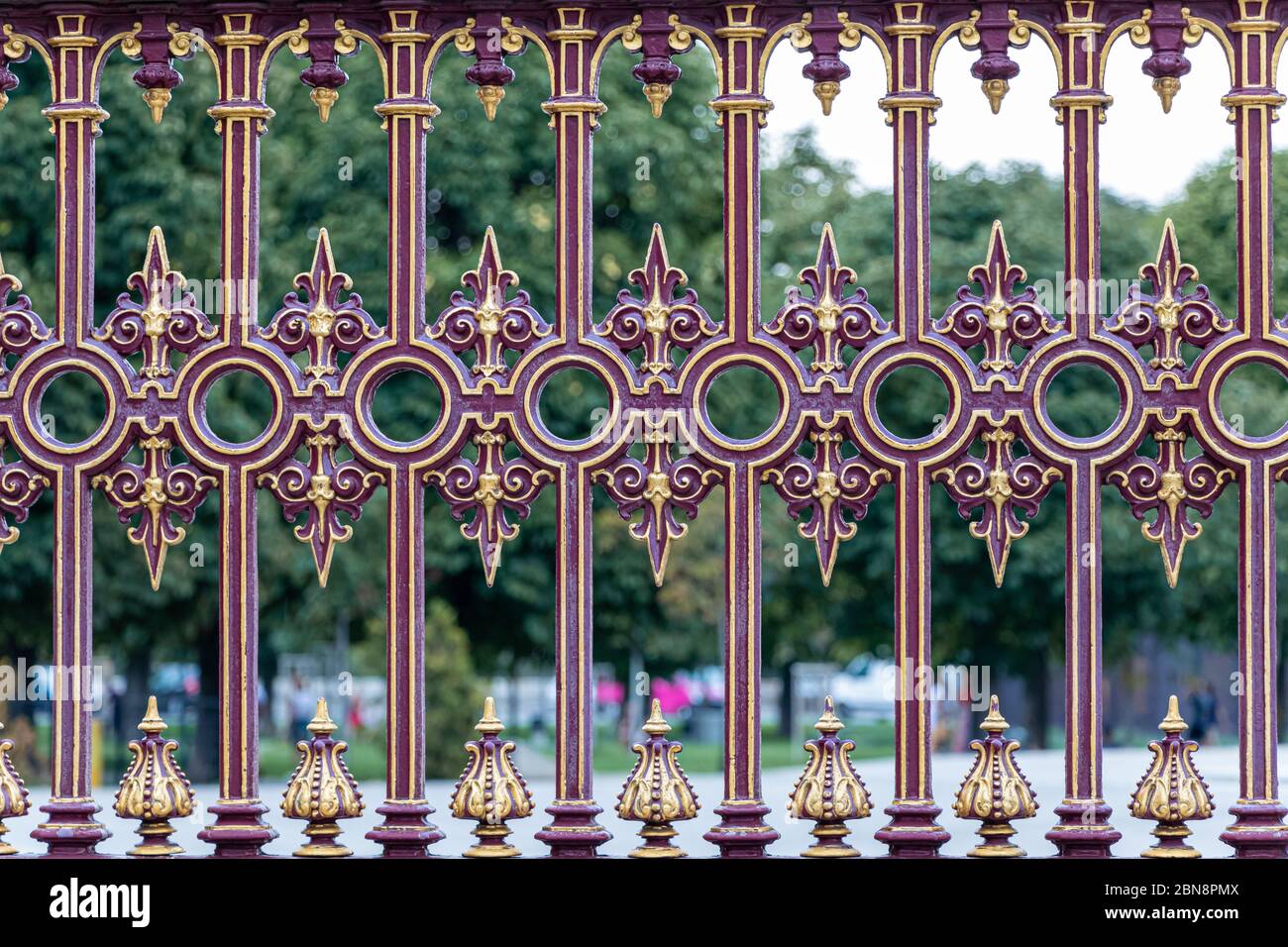 Golden decorated high fence in Vienna, Austria Stock Photo - Alamy