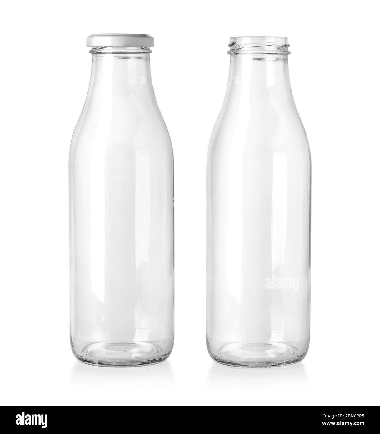 empty milk bottle isolated on white with clipping path Stock Photo - Alamy