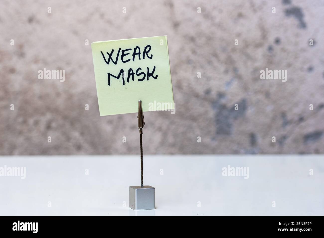 Wear mask handwriting text on memo post reminder isolated with copy ...