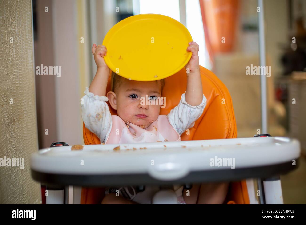 Dirty kid sits table hi-res stock photography and images - Alamy