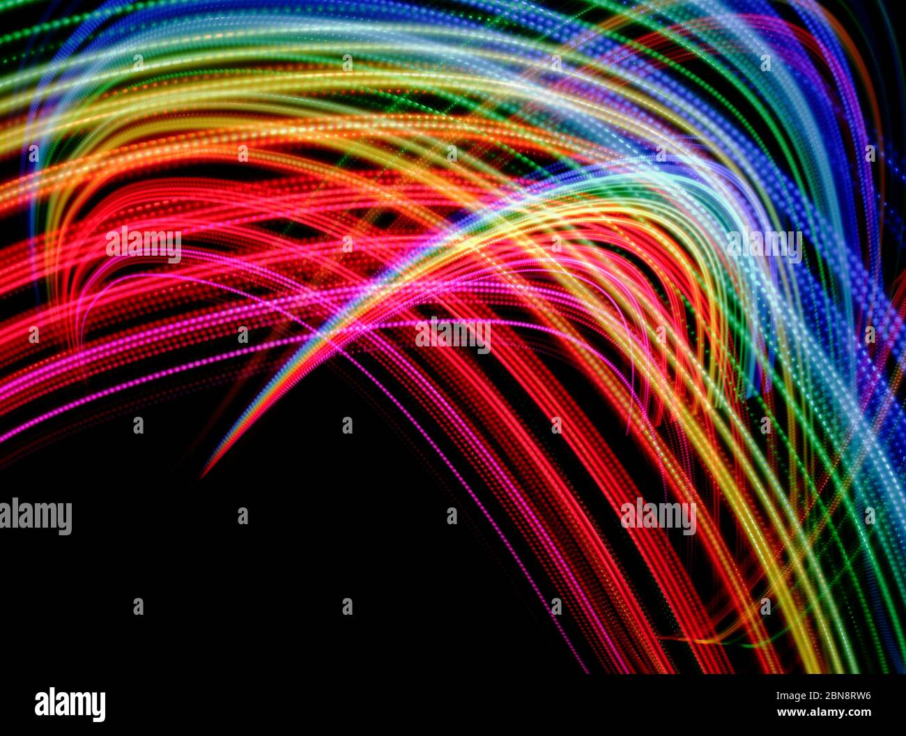 Bright color light on black background Stock Photo - Alamy