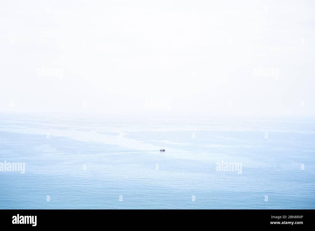 Flat calm blue sea hi-res stock photography and images - Alamy
