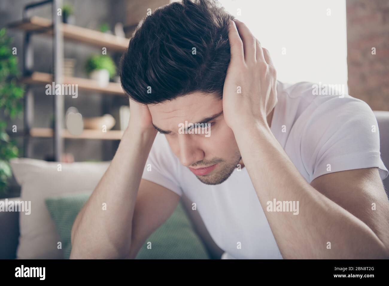 Close-up portrait of his he nice attractive depressed miserable sullen ...
