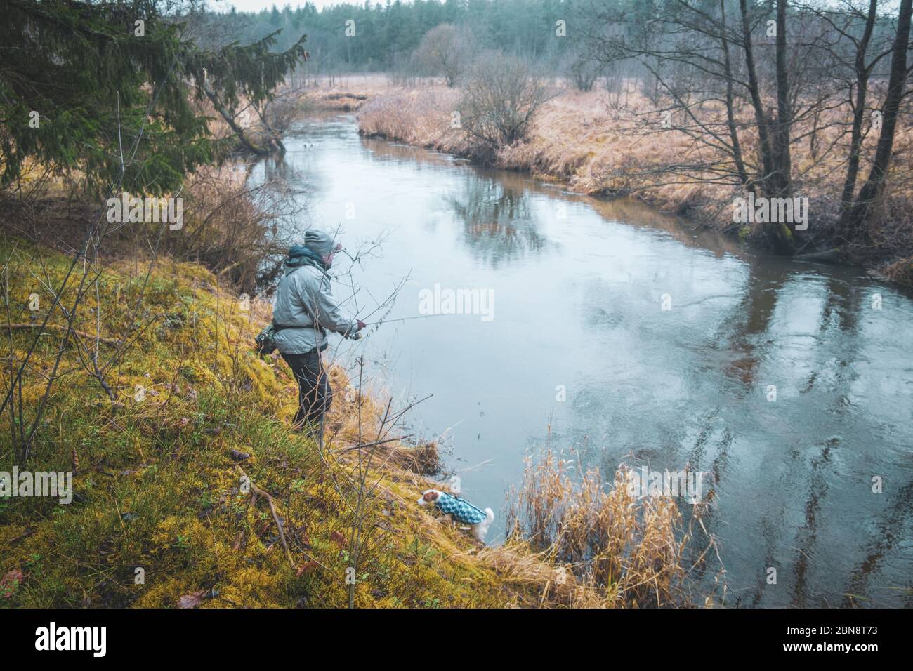 Go fishing with a dog Stock Photo - Alamy