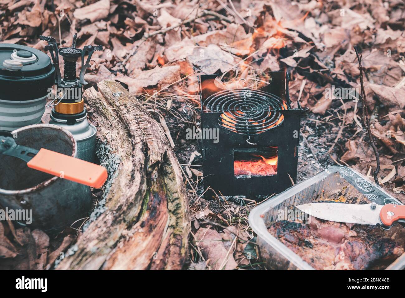 Cooking while hiking with a backpack Stock Photo - Alamy