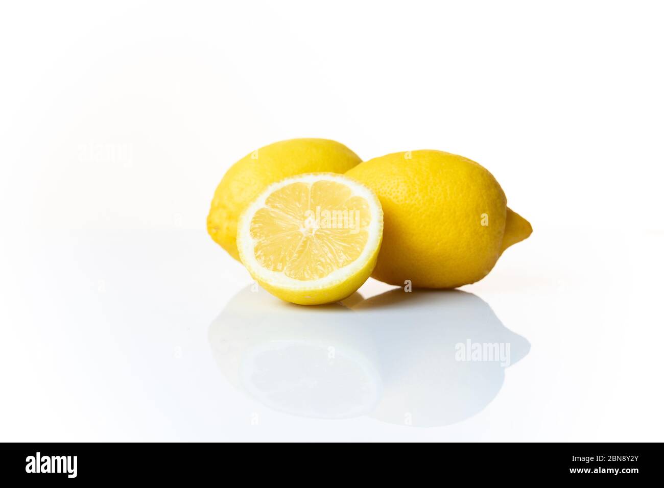 Two half fresh lemon hi-res stock photography and images - Alamy