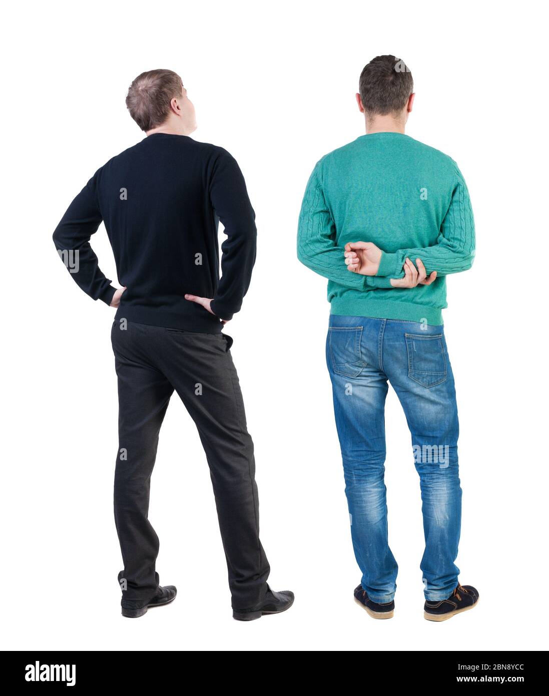 Back view of two man in sweater pointing. Rear view people collection ...