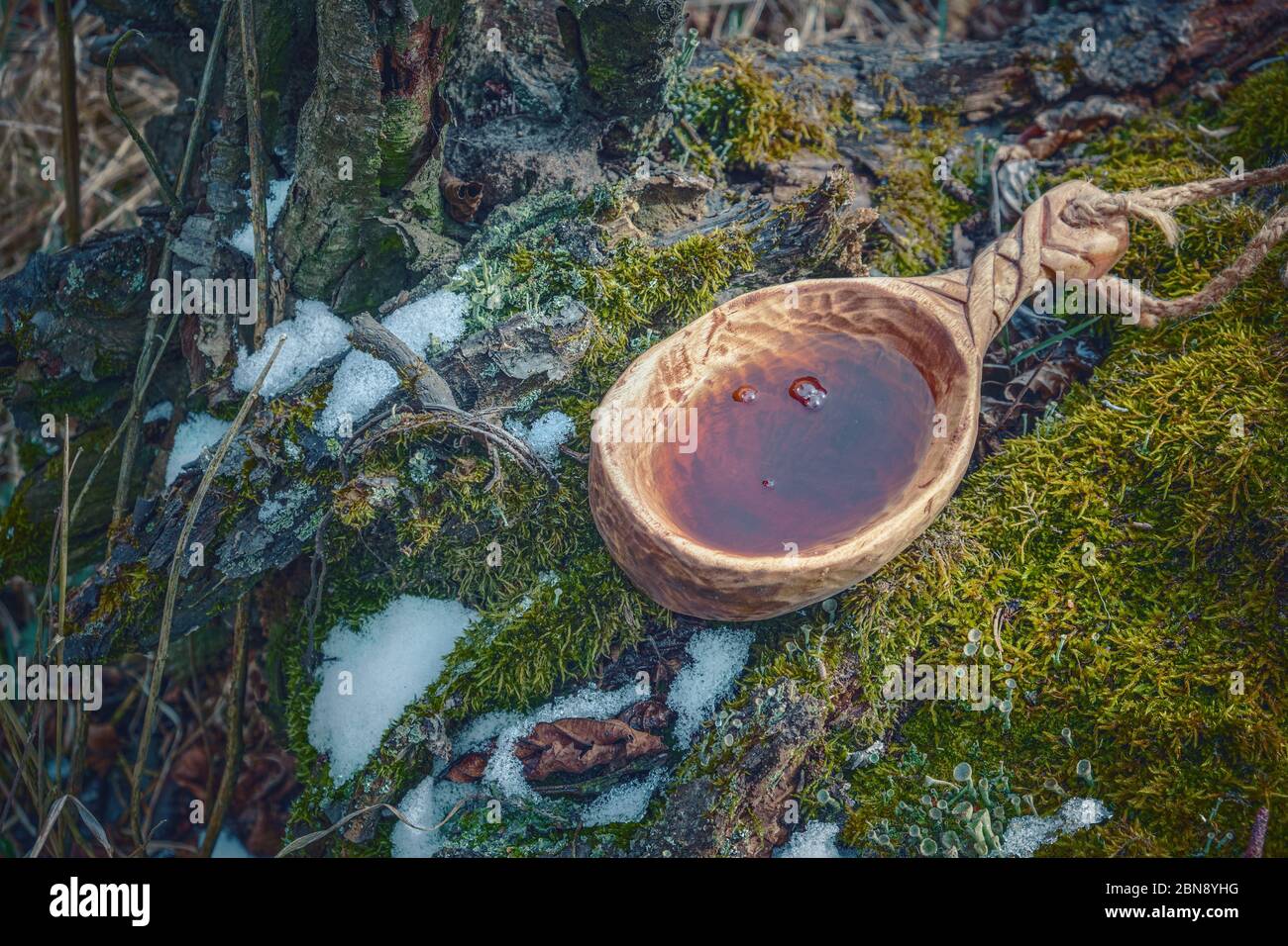 Wooden finnish cup (kuksa) with scenic background Stock Photo - Alamy