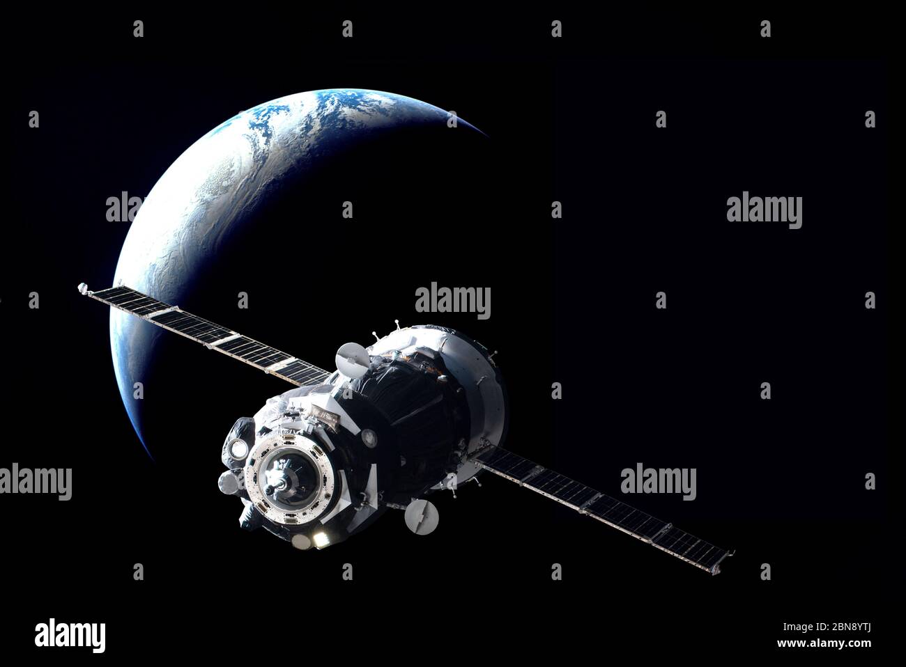 Russian manned spacecraft in orbit around the Earth. Elements of this image furnished by NASA ...