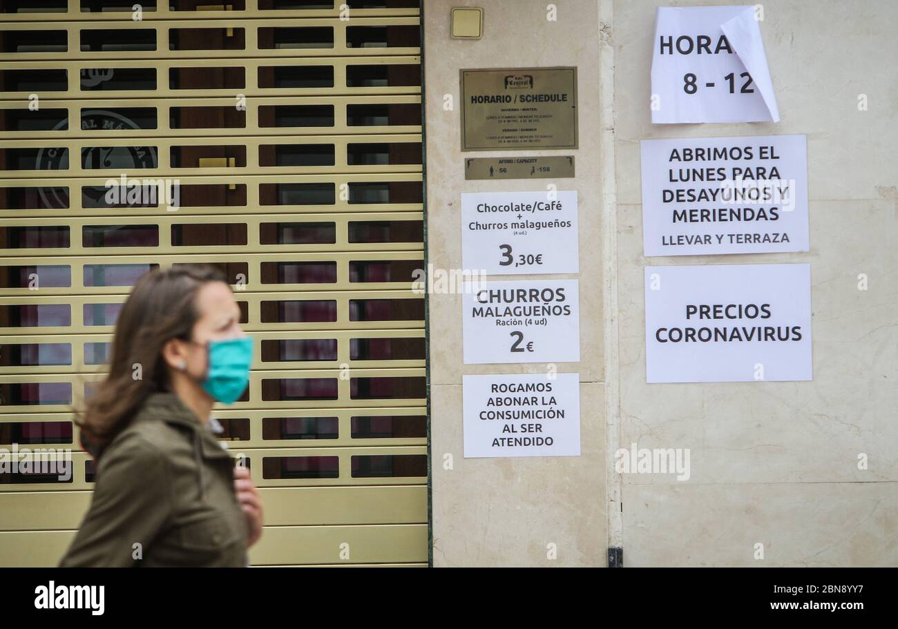 Malaga, Spain. May 13, 2020: 13 May 2020 (Malaga) Citizens use mask as ...