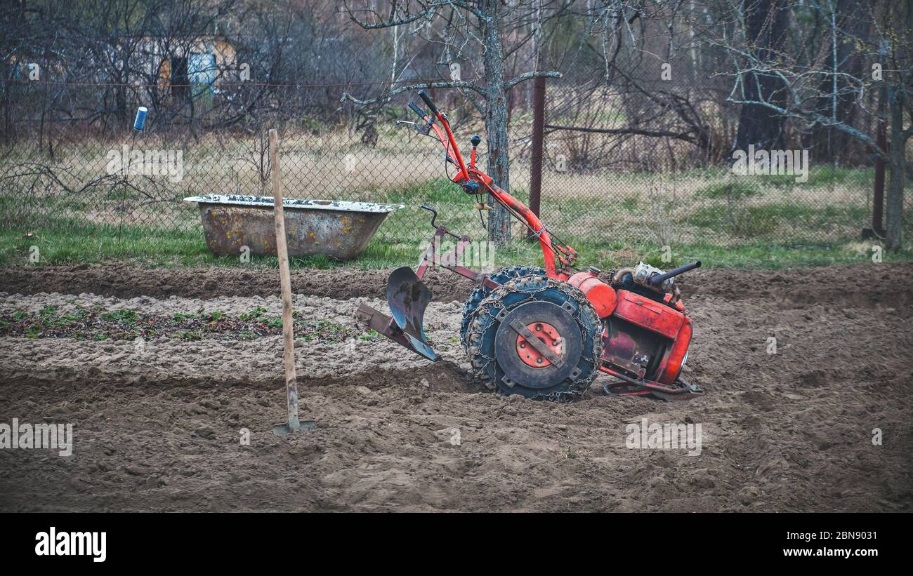 Walk behind tractor hi-res stock photography and images - Alamy