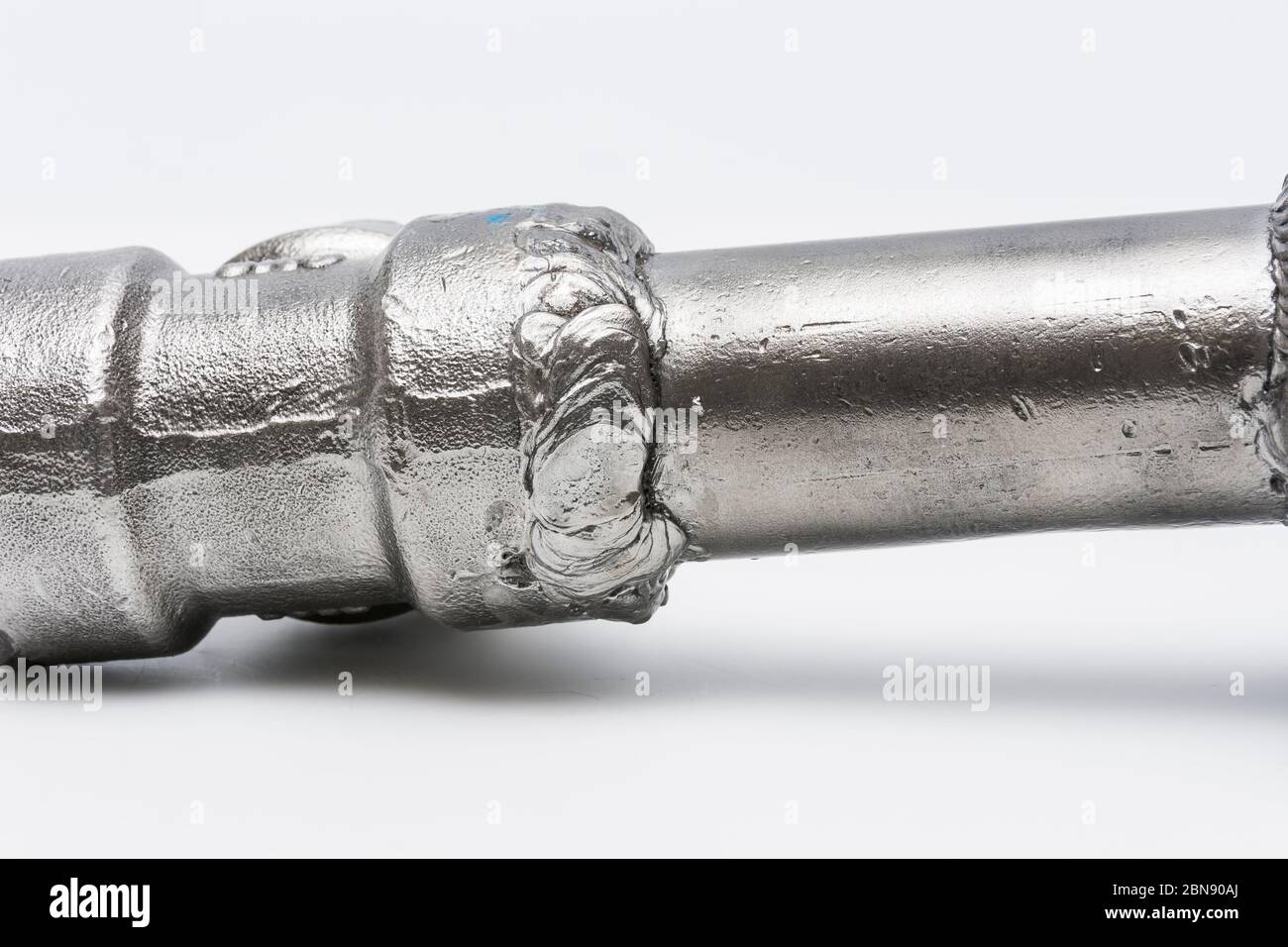 Pipe sections with amateurishly bad welds Stock Photo - Alamy
