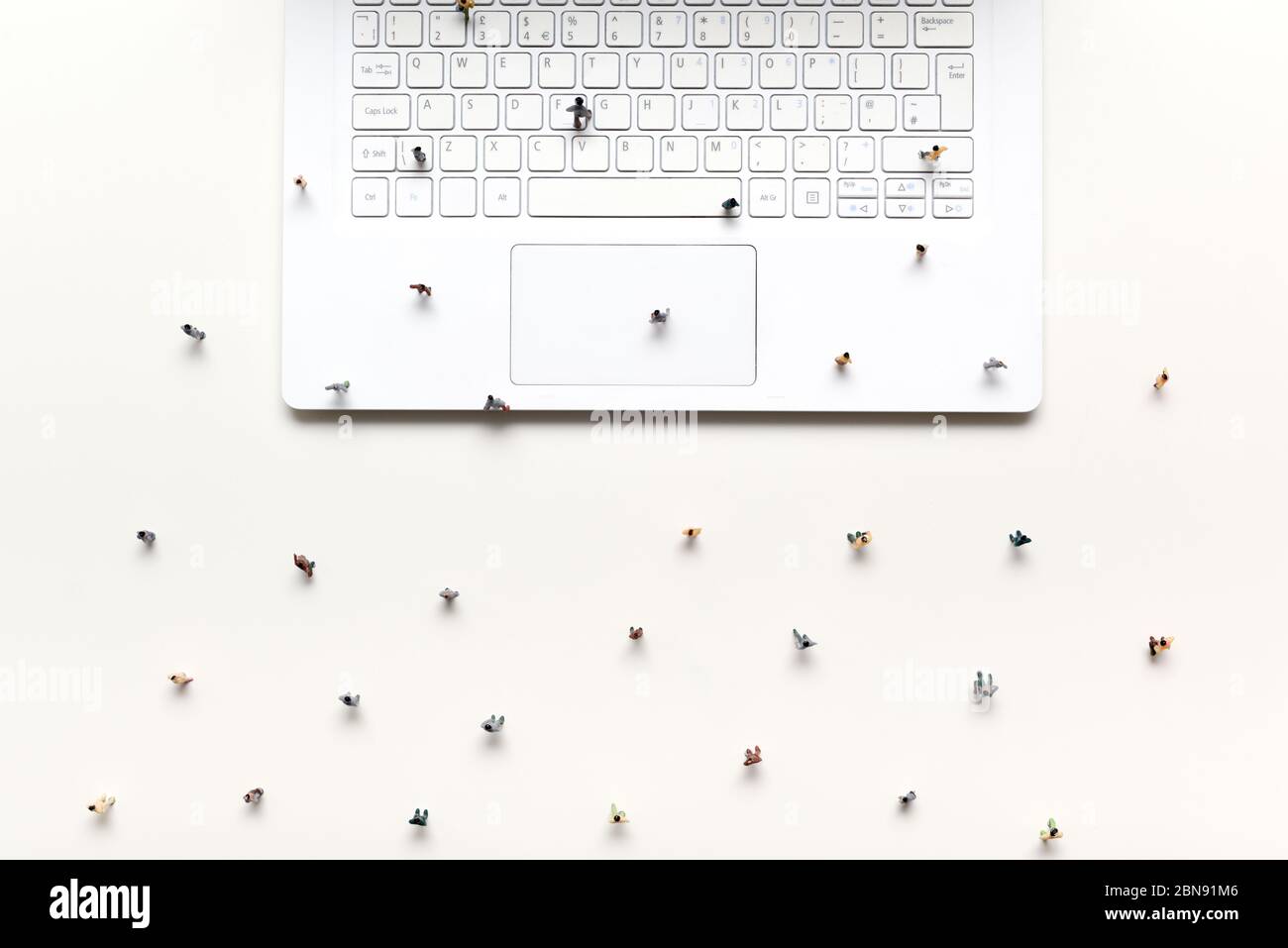 People walking on computer keyboard in concept to show online ...