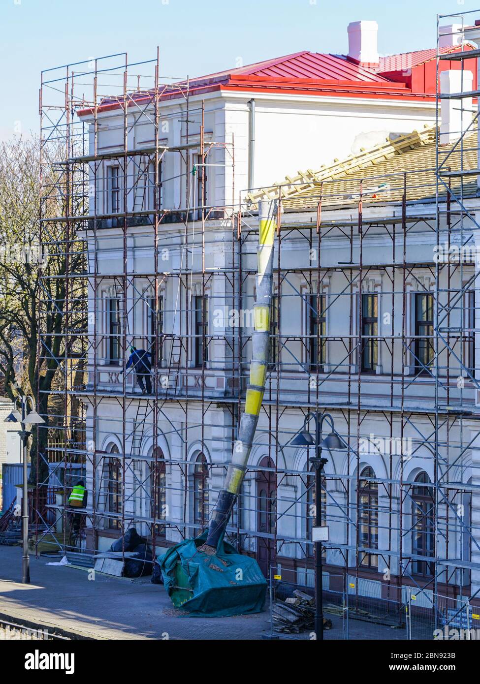 roof repair of a historic building, restoration and painting of the ...
