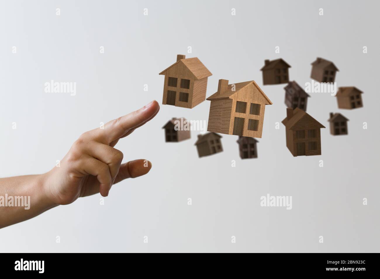 A house in among houses for real estate concept Stock Photo - Alamy
