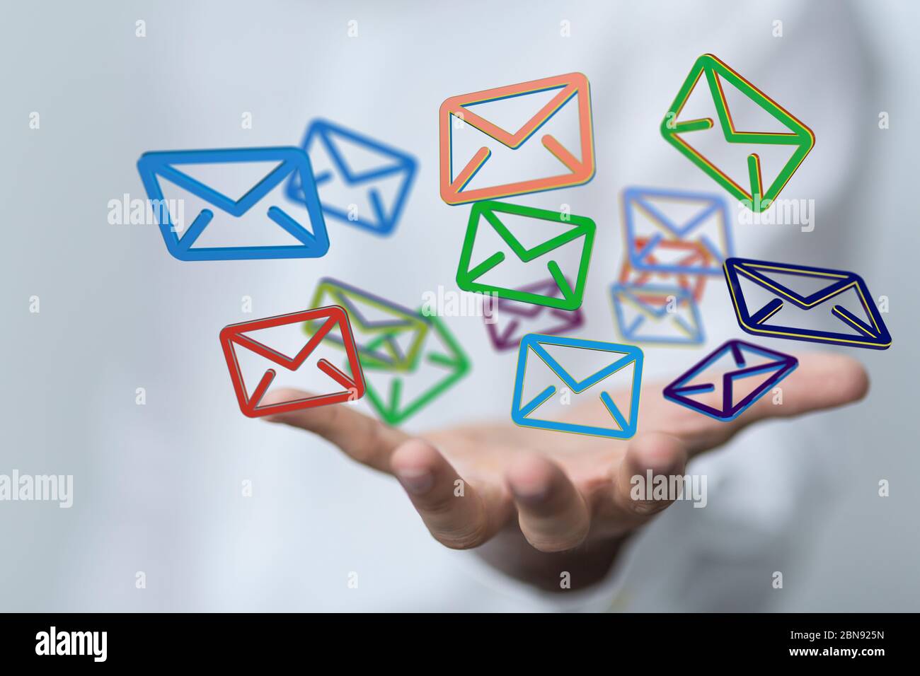 A Hand with an email icon 3d Stock Photo - Alamy