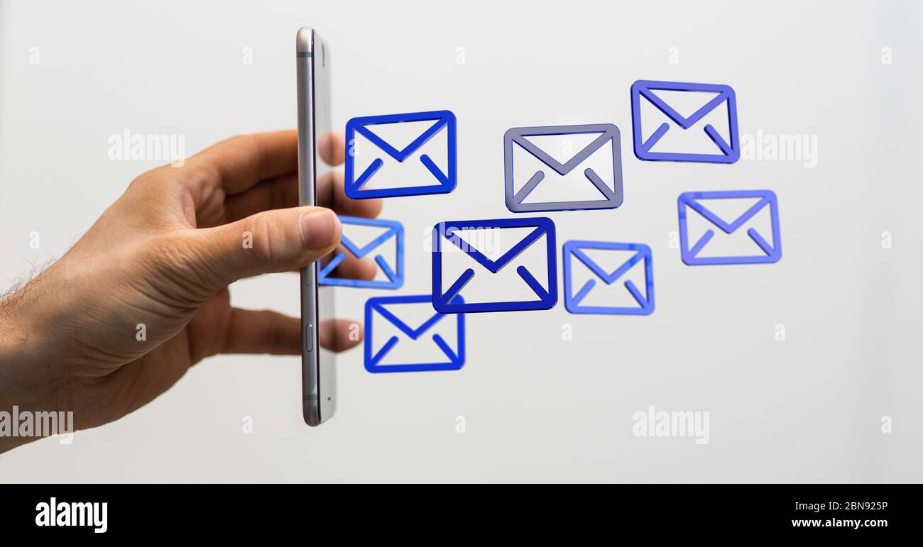 A Hand with an email icon 3d Stock Photo - Alamy